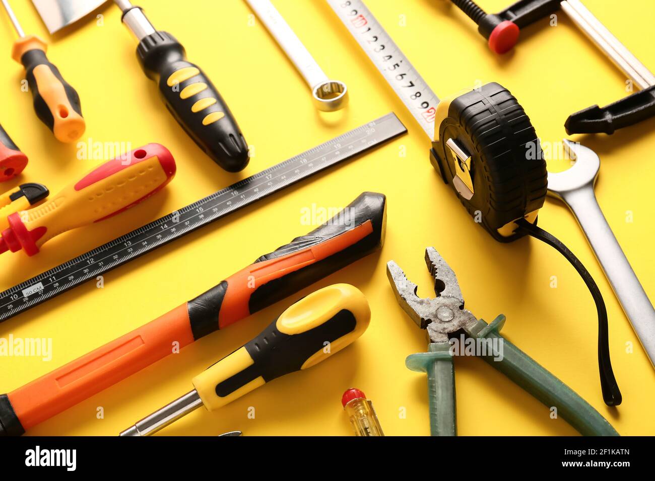 Set of construction tools on color background Stock Photo - Alamy