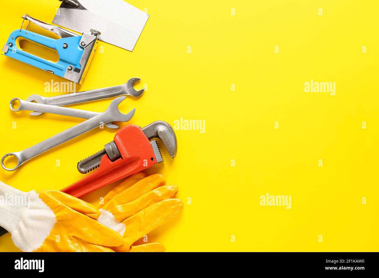 Set of construction tools on color background Stock Photo - Alamy