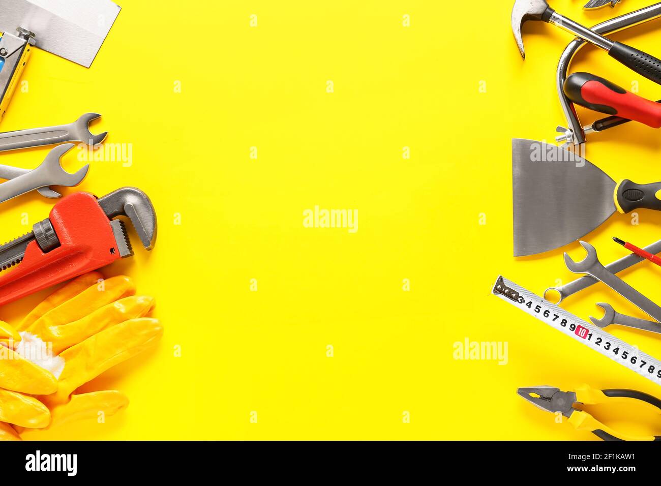 Set of construction tools on color background Stock Photo - Alamy