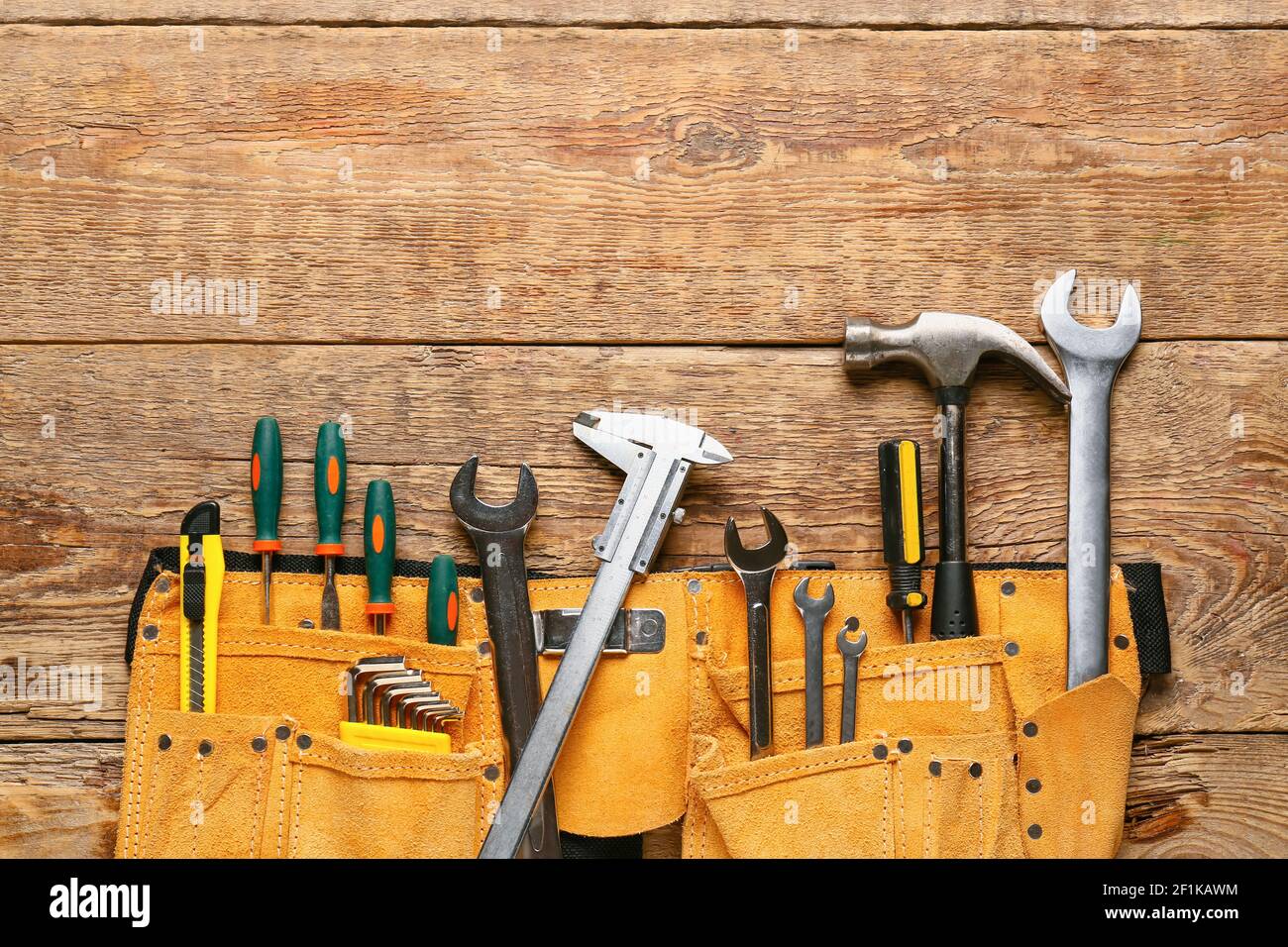 Set of construction tools on wooden background Stock Photo - Alamy