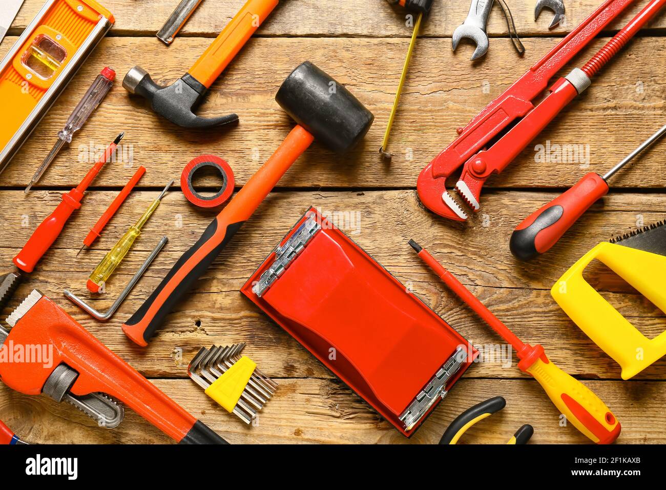 Set of construction tools on wooden background Stock Photo - Alamy