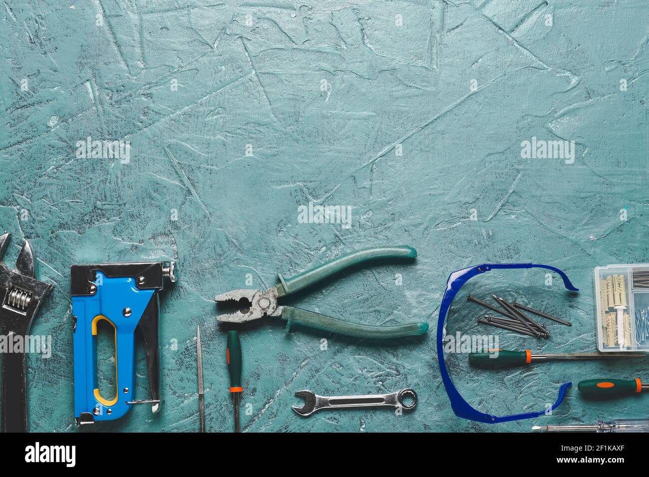 Set of construction tools on color background Stock Photo - Alamy