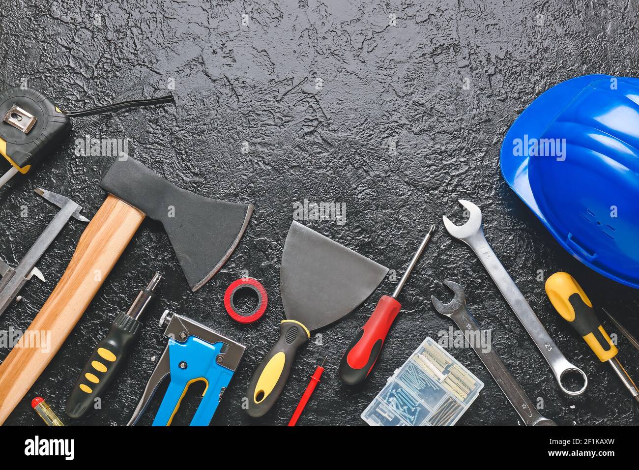 Set of construction tools on dark background Stock Photo - Alamy
