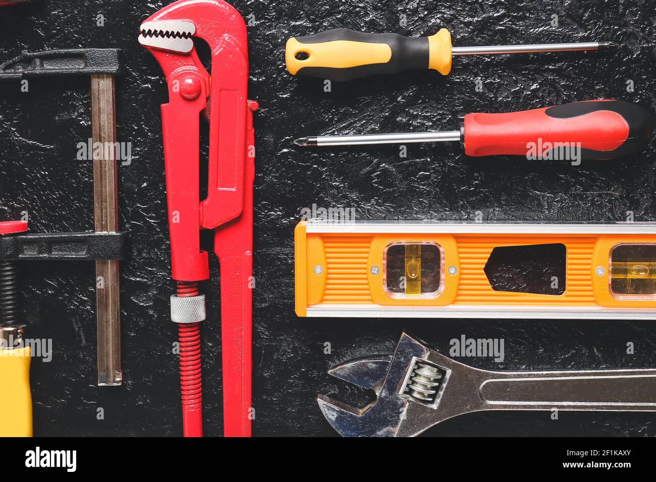 Set of construction tools on dark background Stock Photo - Alamy