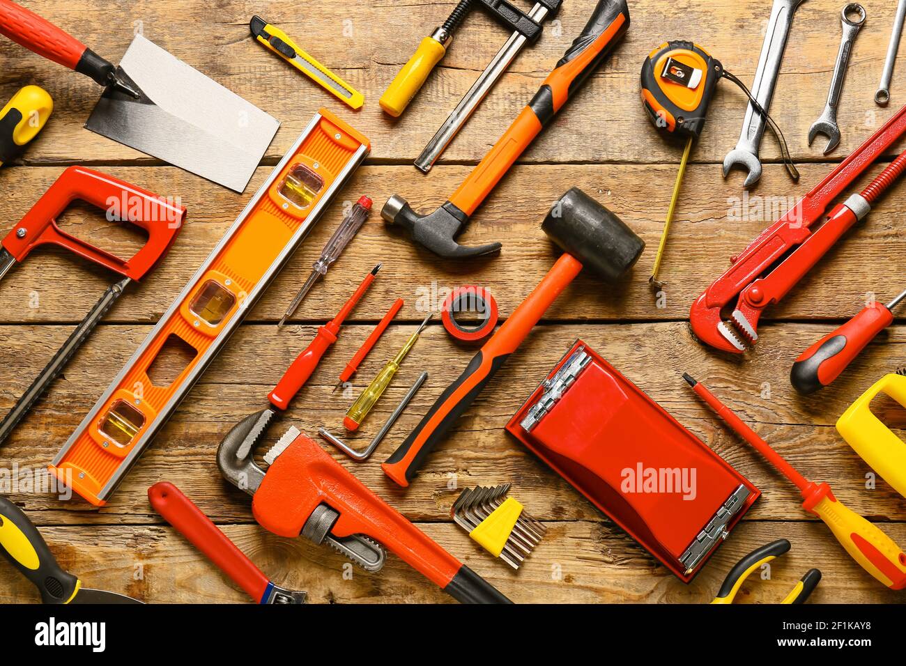 Set of construction tools on wooden background Stock Photo - Alamy
