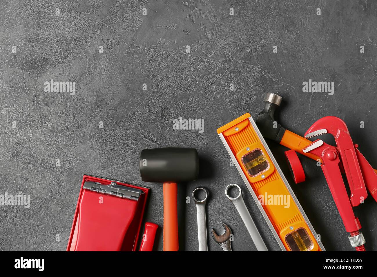 Set of construction tools on dark background Stock Photo - Alamy