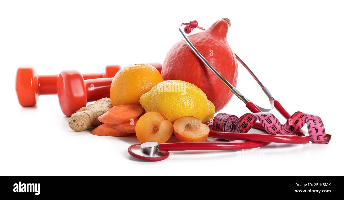 Healthy products, dumbbells and stethoscope on white background Stock ...