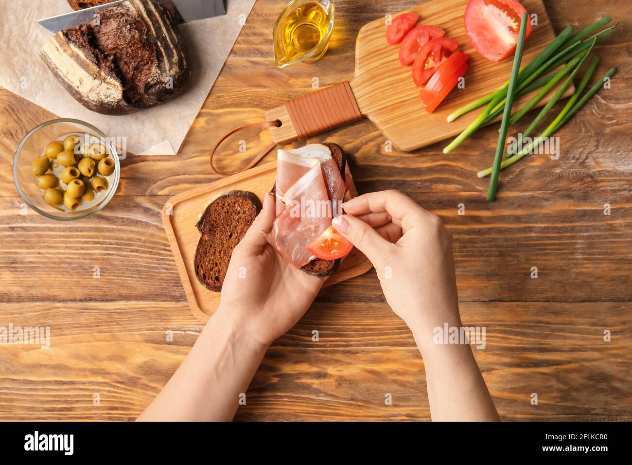 Preparing sandwiches hi-res stock photography and images - Alamy