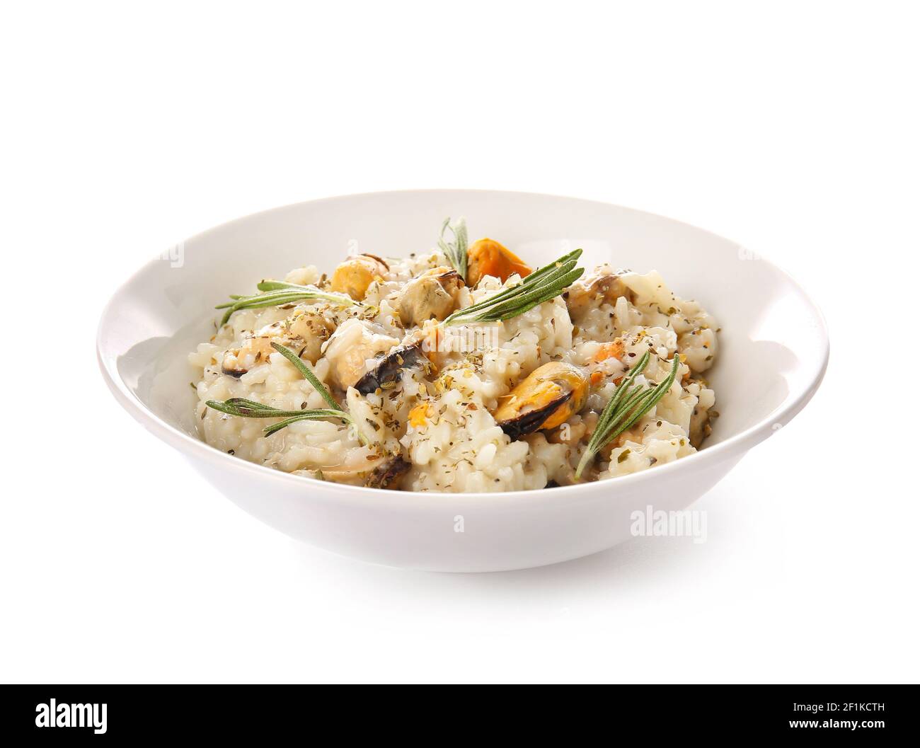 Plate with tasty risotto on white background Stock Photo - Alamy
