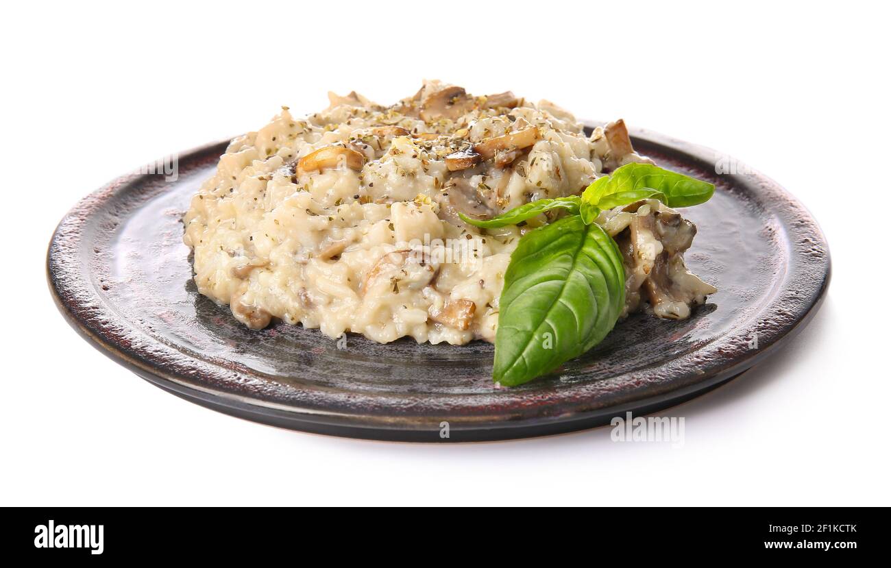 Plate with tasty risotto on white background Stock Photo - Alamy