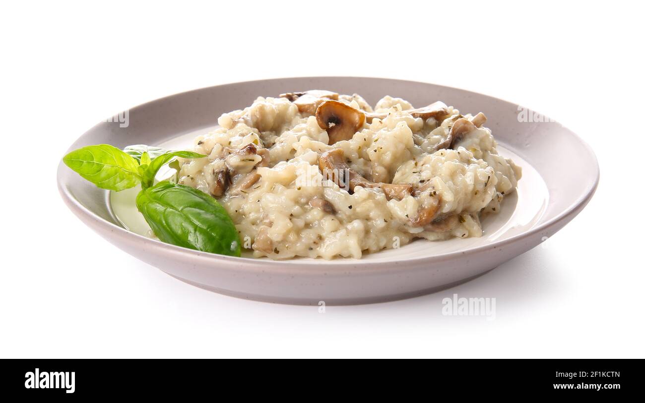 Plate with tasty risotto on white background Stock Photo - Alamy