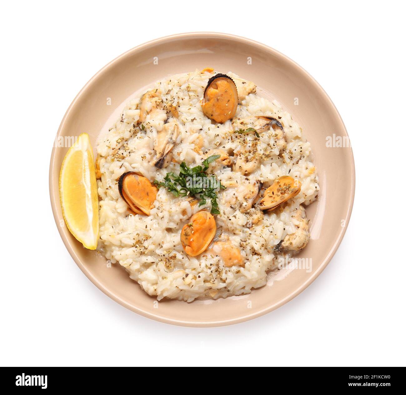 Plate with tasty risotto on white background Stock Photo - Alamy