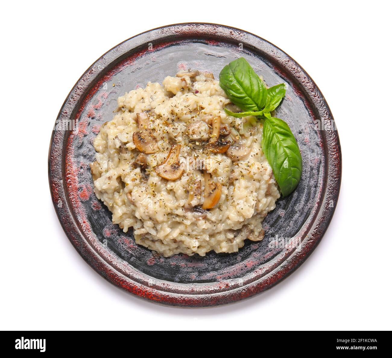 Plate with tasty risotto on white background Stock Photo - Alamy