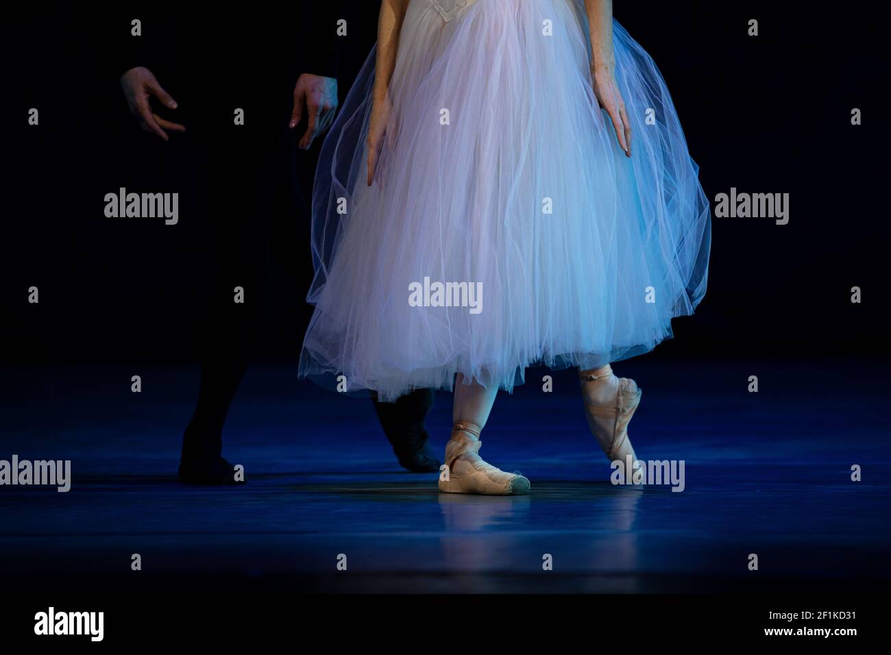Closeup of ballerina dancing isolated on stage. Ballerina legs closeup Stock Photo - Alamy
