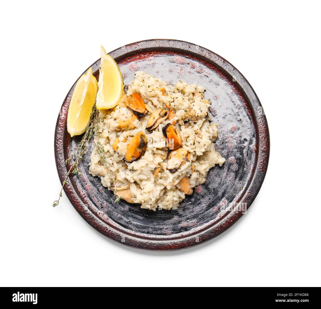 Plate with tasty risotto on white background Stock Photo - Alamy
