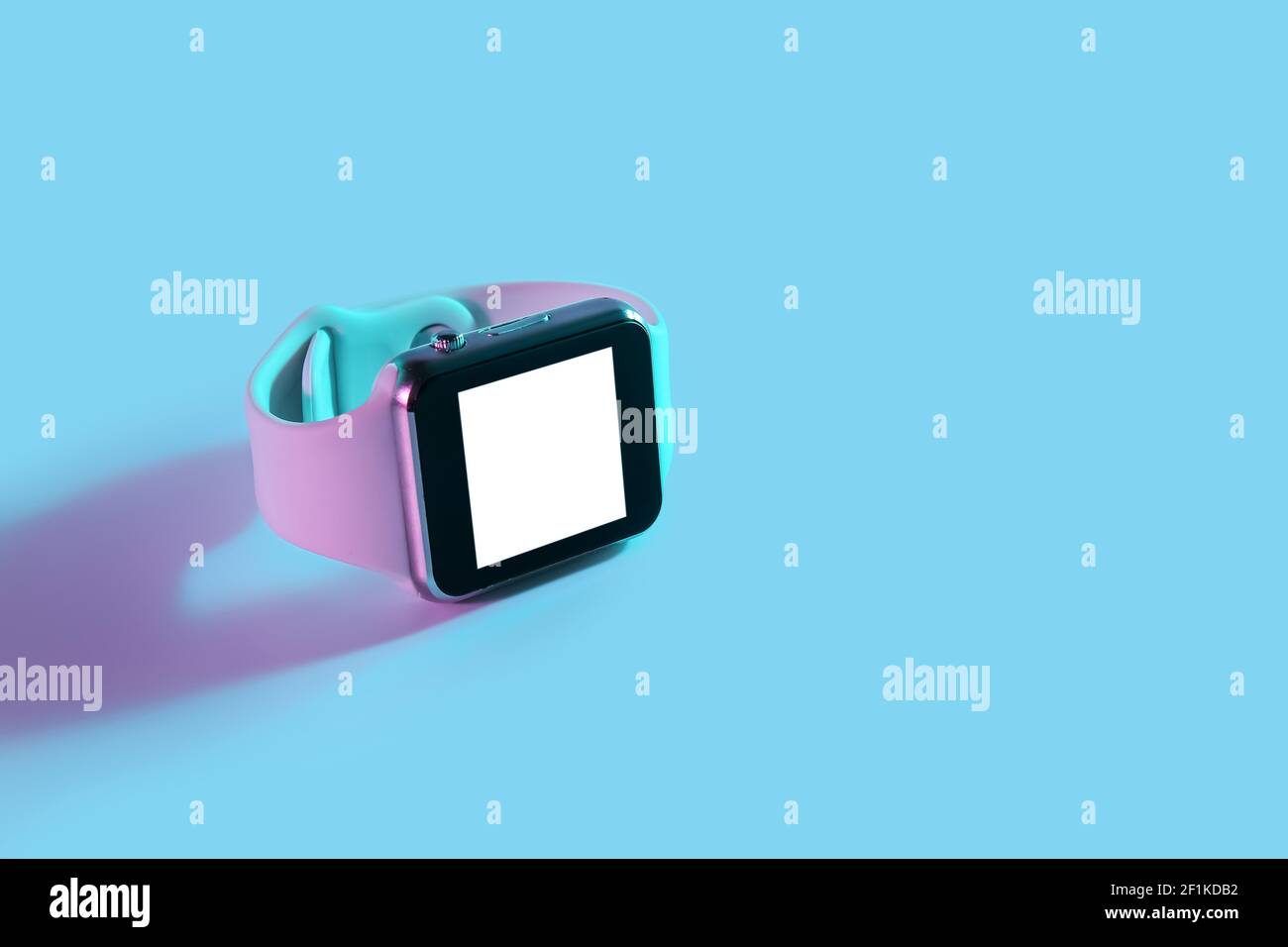 Modern smart watch on color background Stock Photo - Alamy