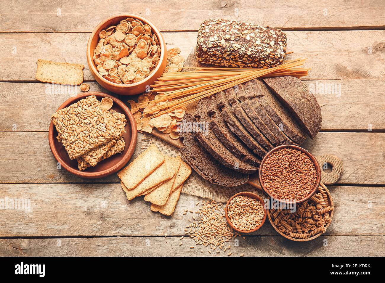 Set of different products on wooden background Stock Photo - Alamy