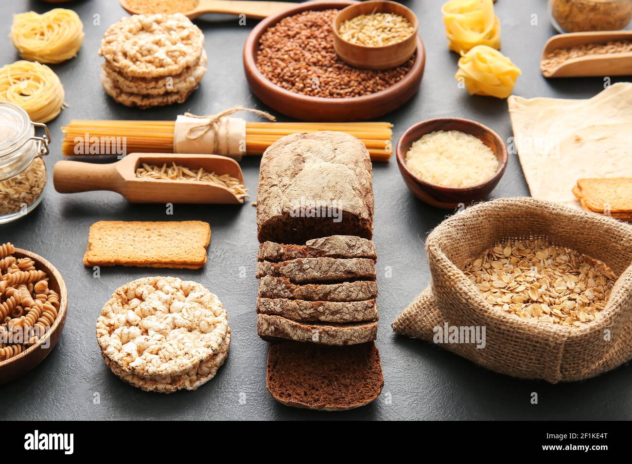 Set of different products on dark background Stock Photo - Alamy