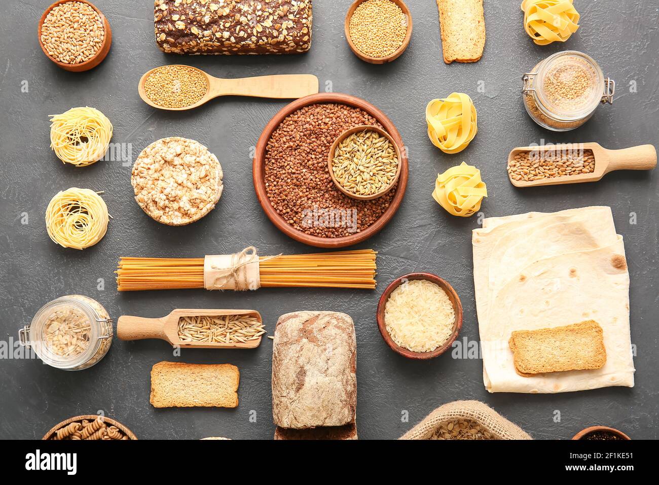 Set of different products on dark background Stock Photo - Alamy