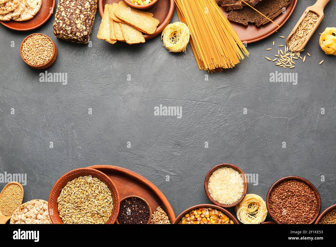 Set of different products on dark background Stock Photo - Alamy