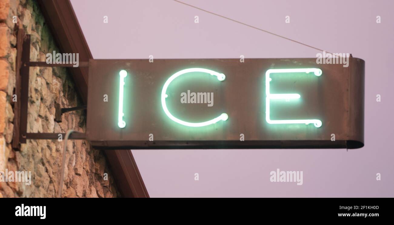 Blue Green Neon Simple Rusty Metal Sign Says Ice Stock Photo - Alamy