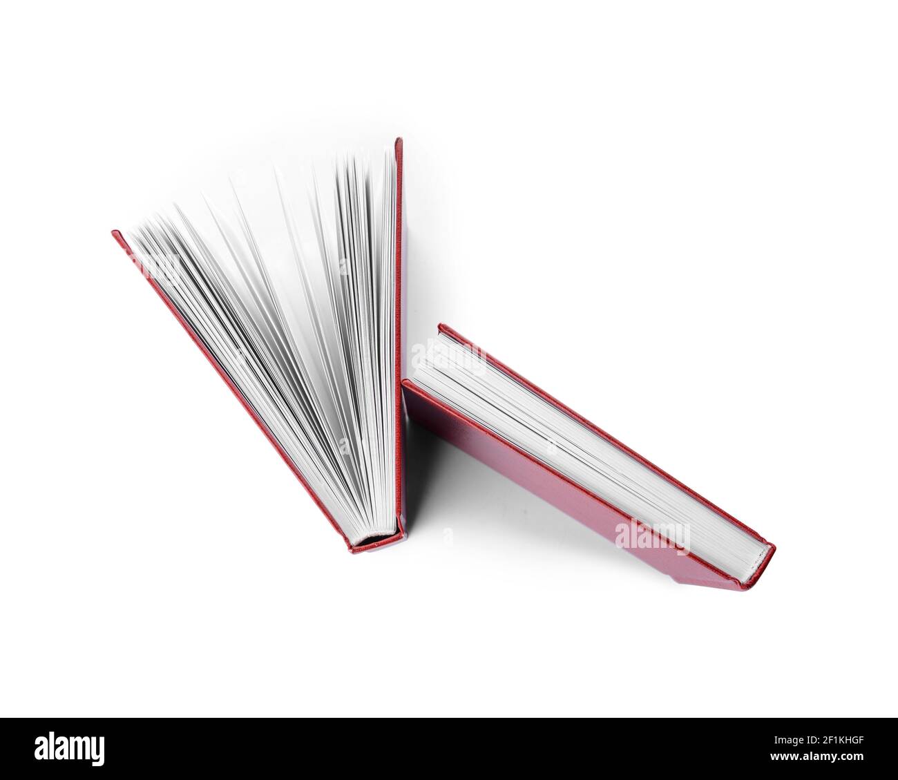 Books with red cover on white background Stock Photo - Alamy