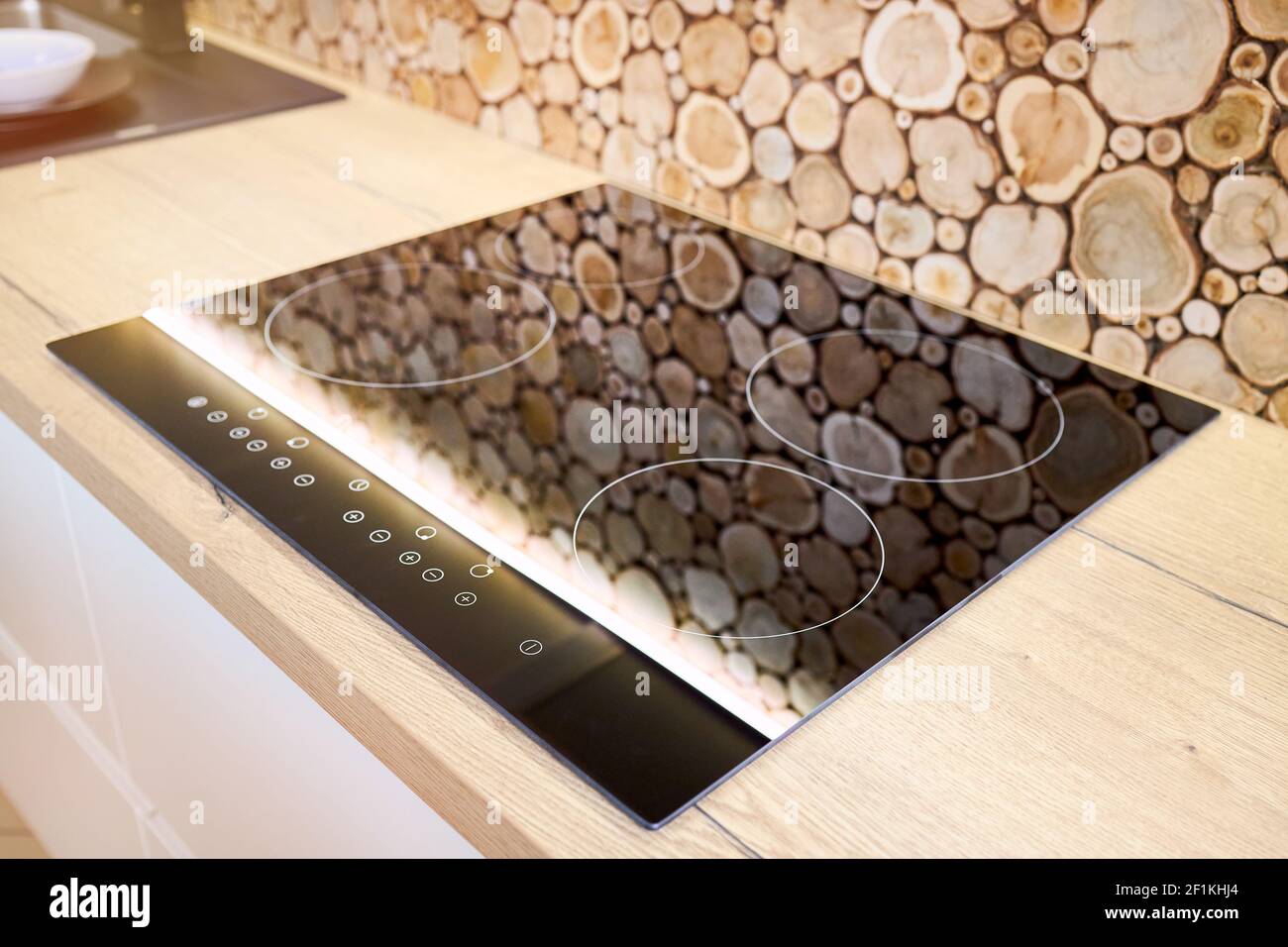 Contemporary kitchen interior black induction stove, cooker, hob or ...