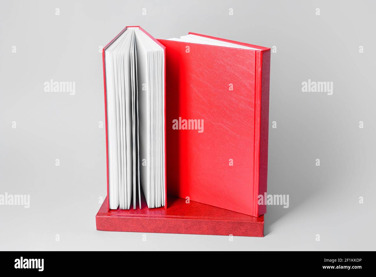 Blank books on light background Stock Photo - Alamy