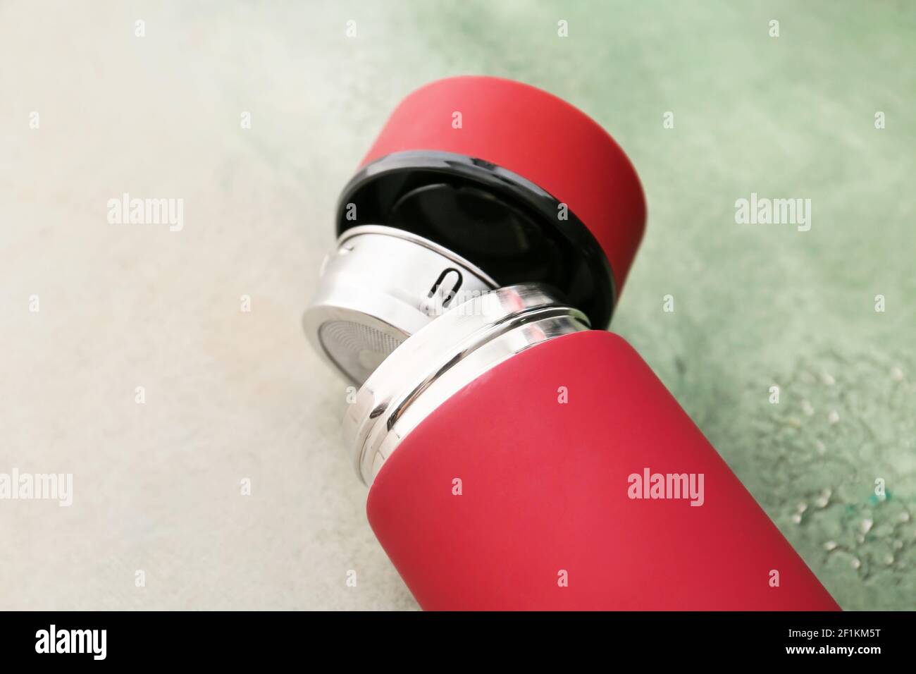 Modern thermos on grunge background, closeup Stock Photo - Alamy