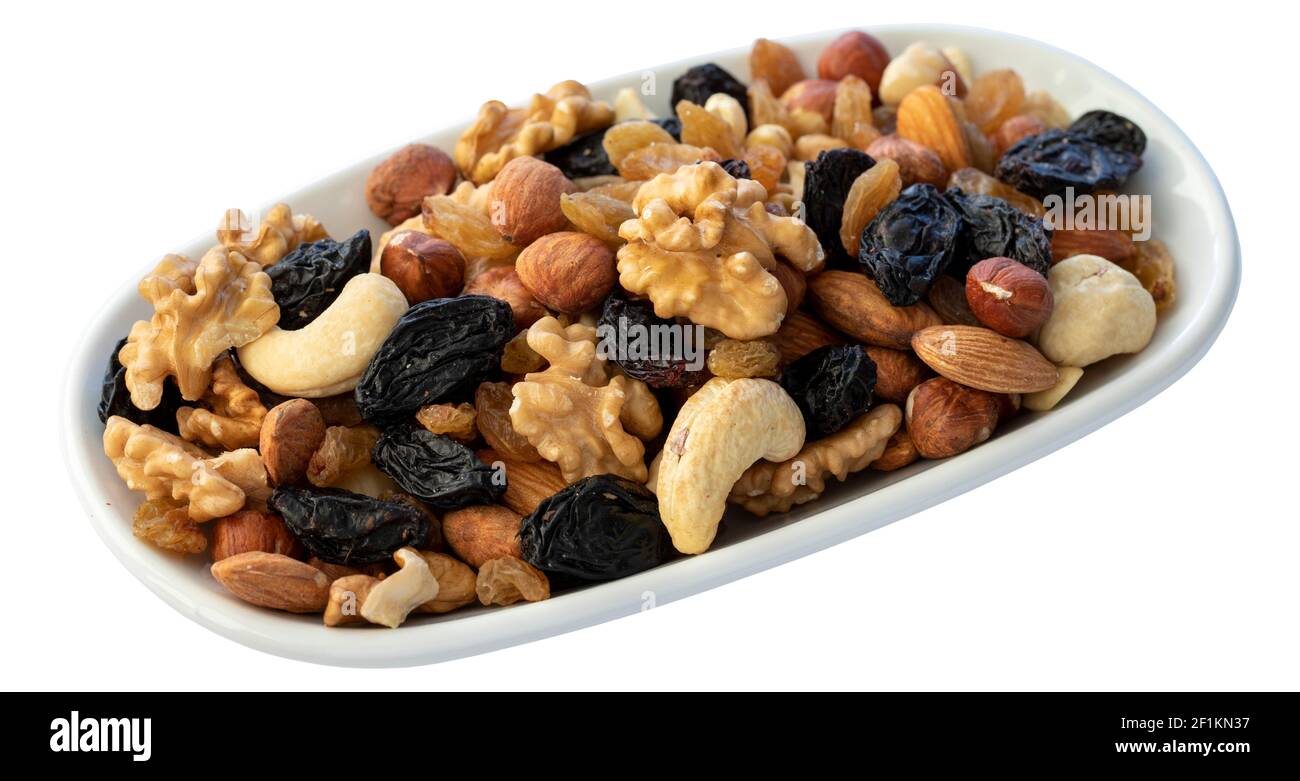 Mixed natural snack isolated on white background Stock Photo - Alamy