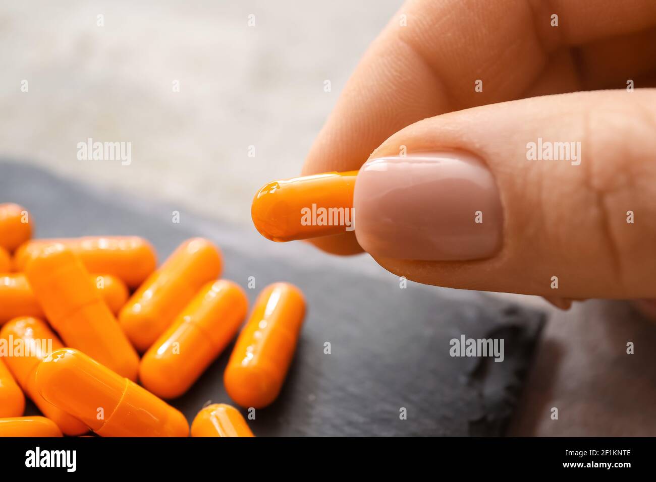 Female hand turmeric powder hi-res stock photography and images - Alamy