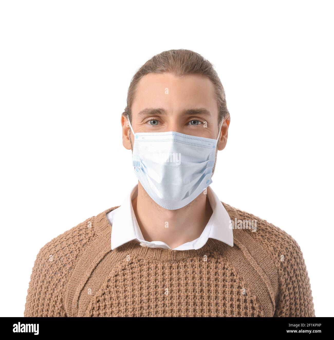 Man wearing medical mask on white background Stock Photo - Alamy