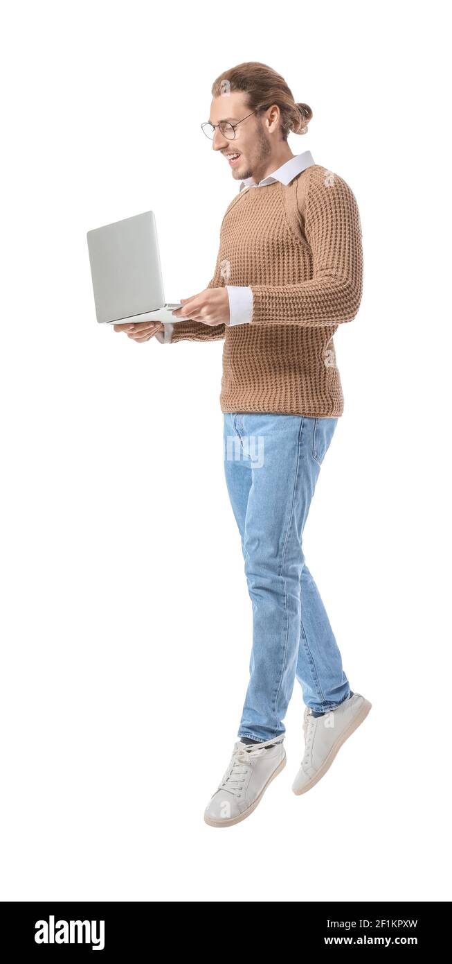 Man jumping using laptop hi-res stock photography and images - Alamy