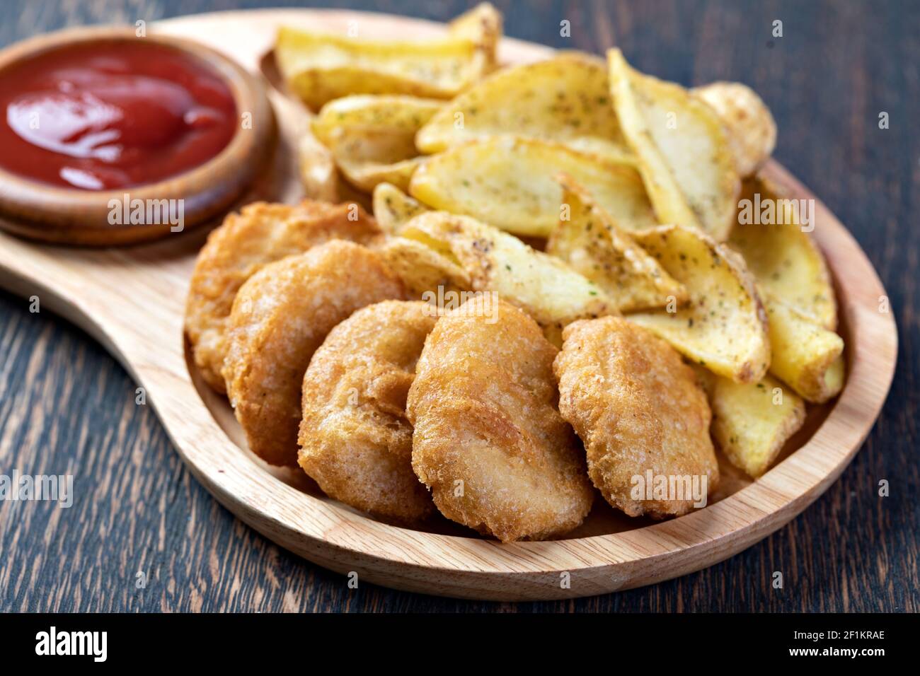 Chicken nuggets with potatoes hi-res stock photography and images - Alamy