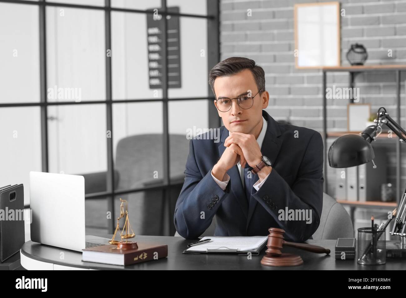 Male judge working in office Stock Photo - Alamy