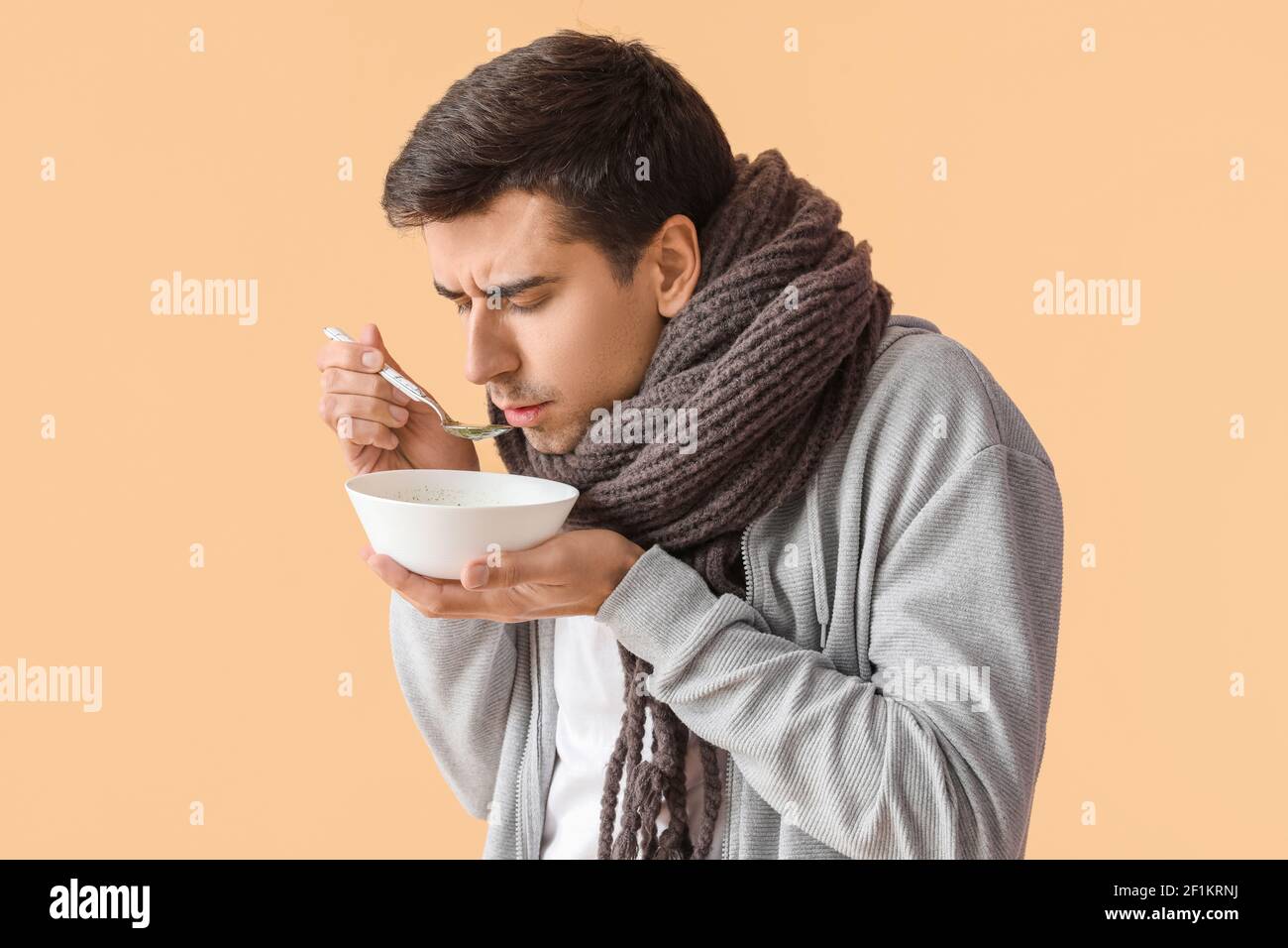 Sick man with chicken soup hi-res stock photography and images - Alamy