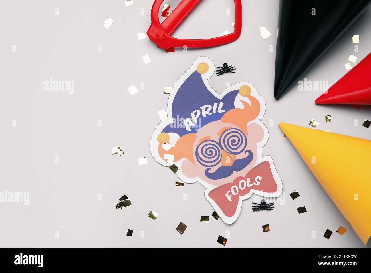 Party decor for April Fools Day on grey background Stock Photo - Alamy