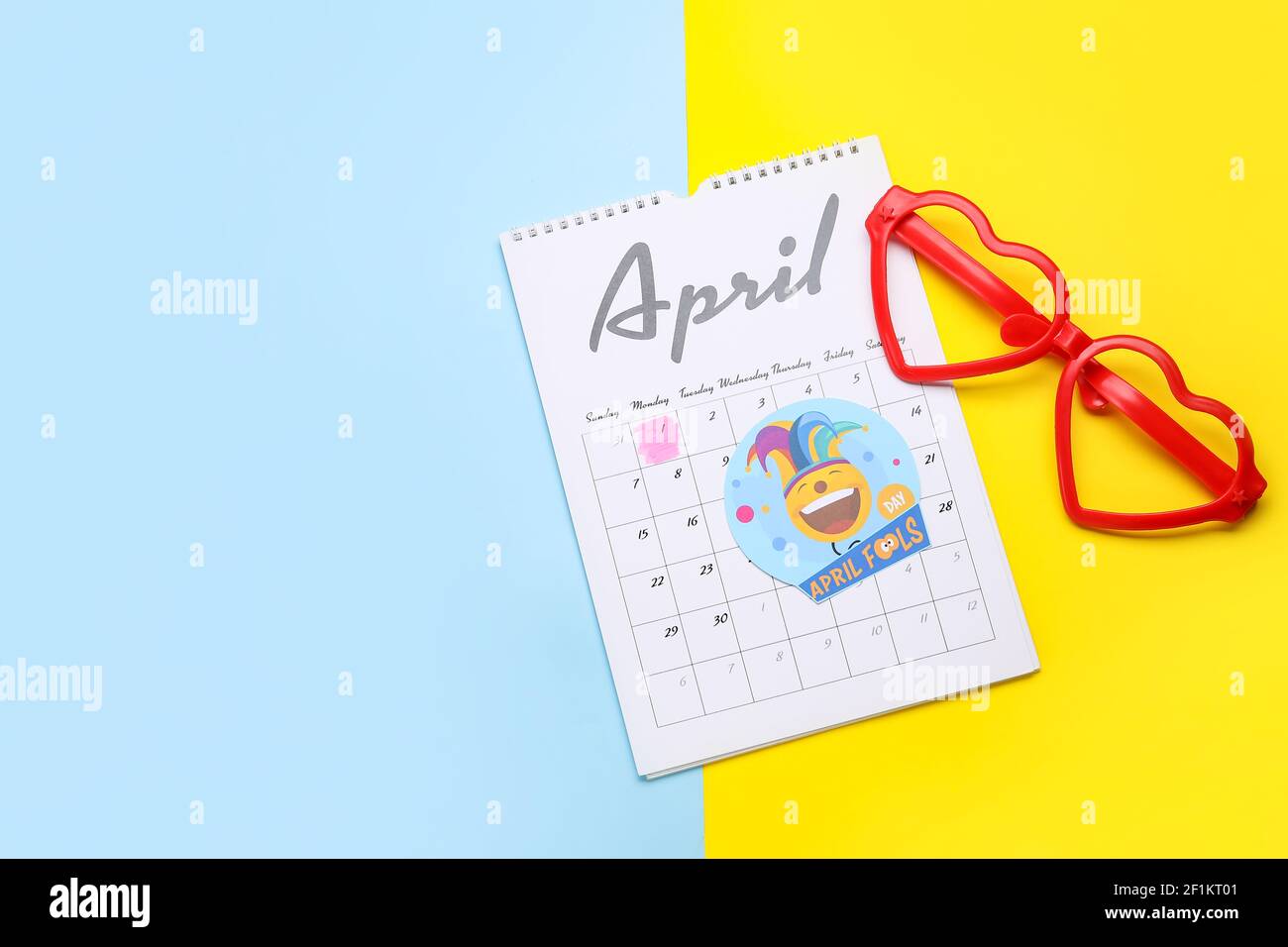 Party decor and calendar with date of April Fools Day on color ...