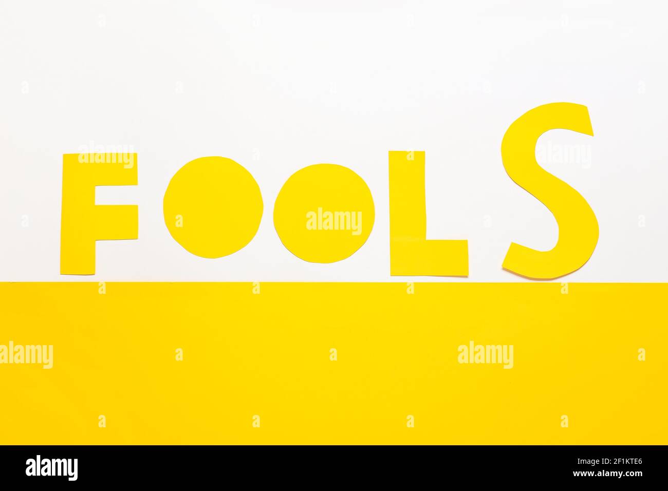 Word FOOLS on white background Stock Photo - Alamy