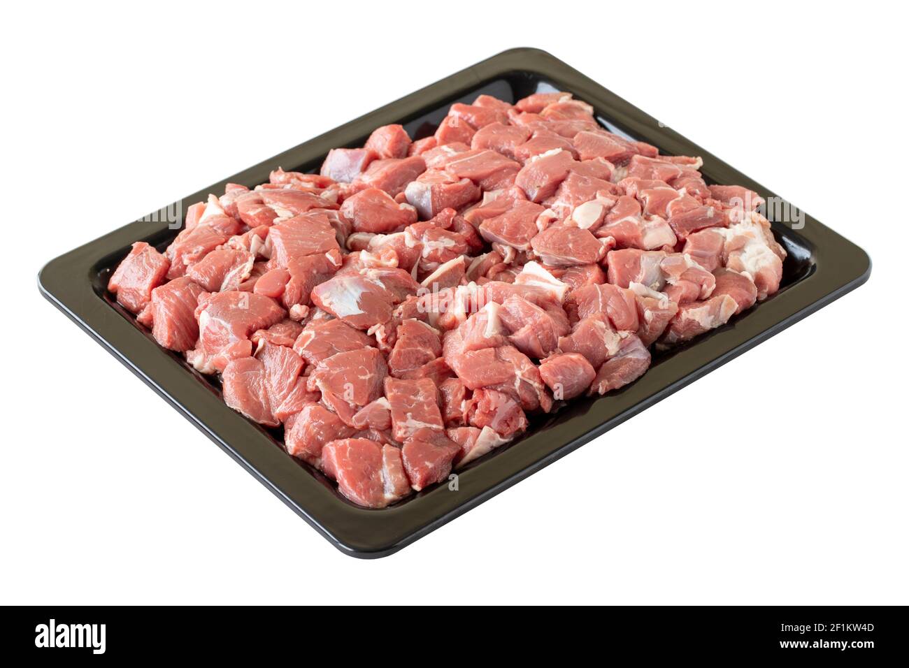 Raw Lamb cubes isolated on white background Stock Photo - Alamy