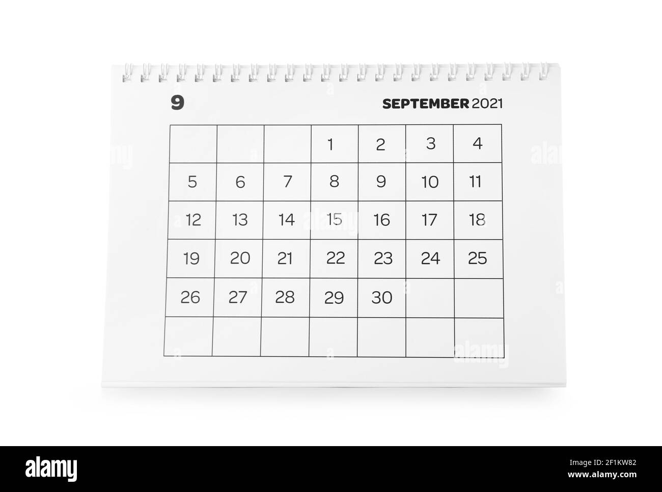 Flip paper calendar on white background Stock Photo - Alamy