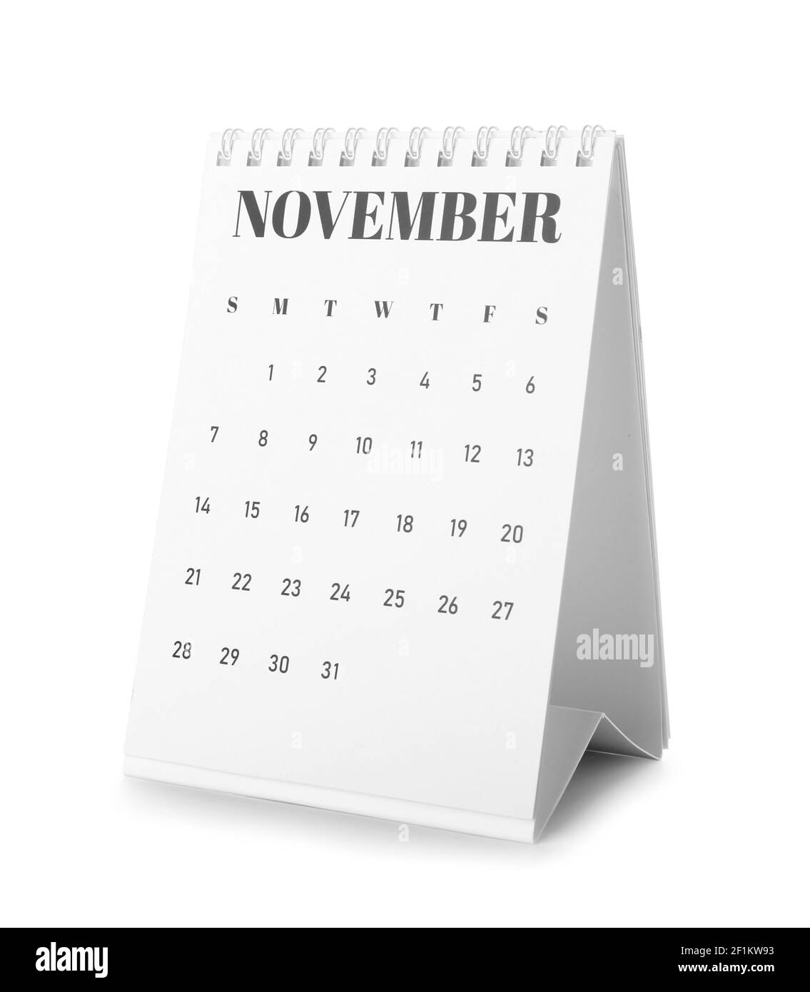 Flip paper calendar on white background Stock Photo - Alamy