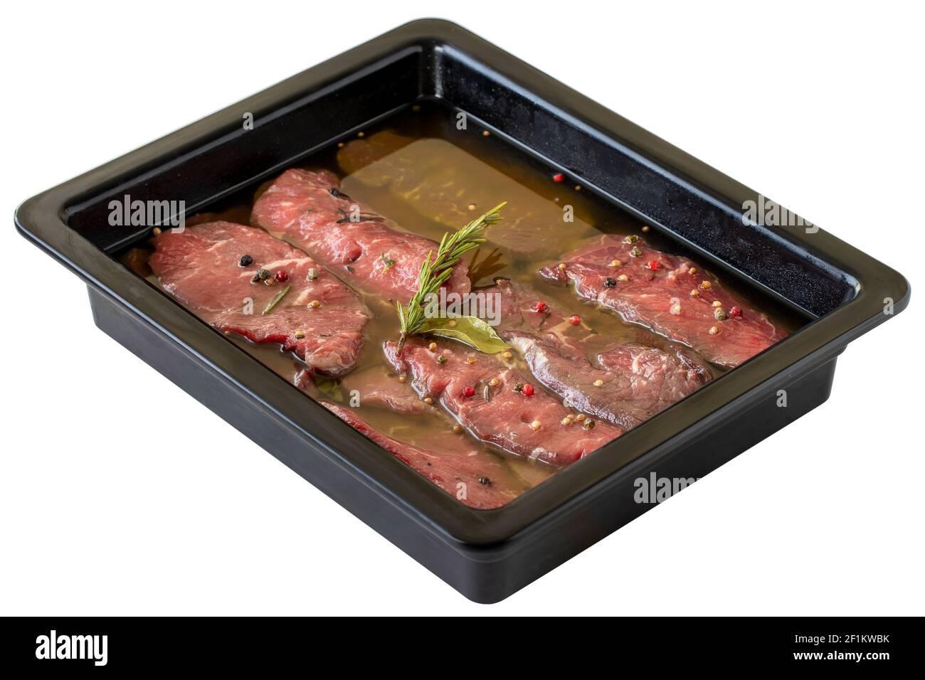 Marinated Raw beef steak isolated on white background Stock Photo - Alamy