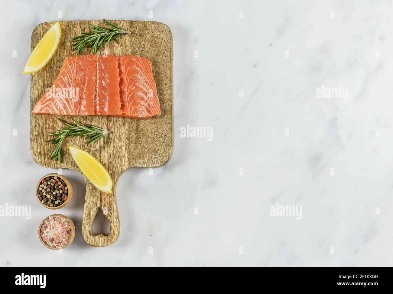 Fresh raw Atlantic salmon on the plate. Great source of omega-3 fatty ...