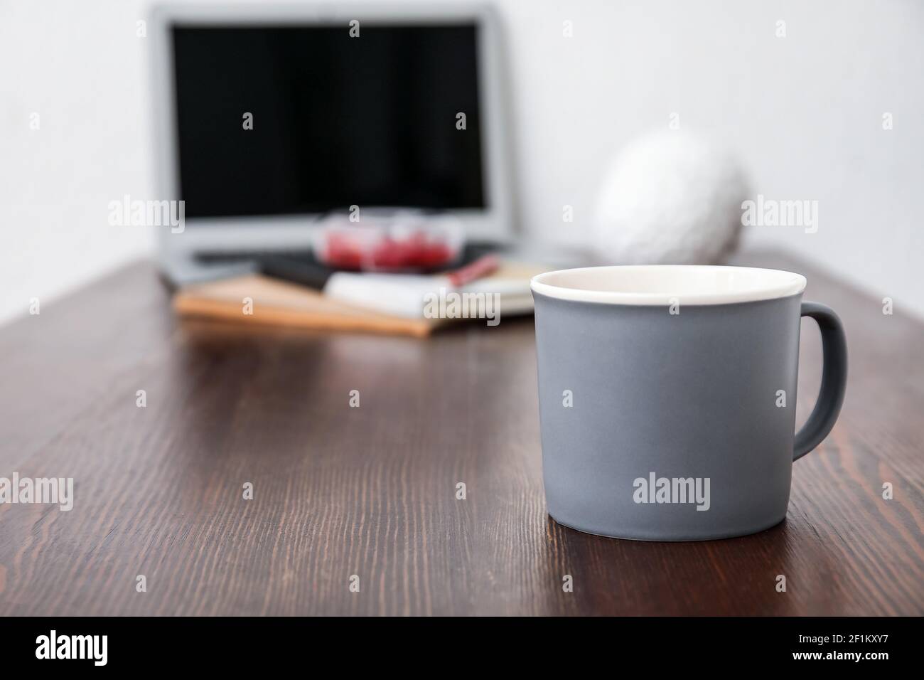 Cup of tea on office table Stock Photo - Alamy