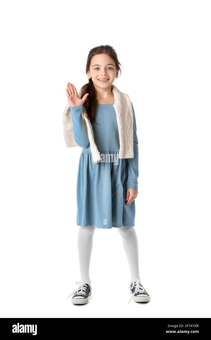 Cute little girl waving hand on white background Stock Photo - Alamy