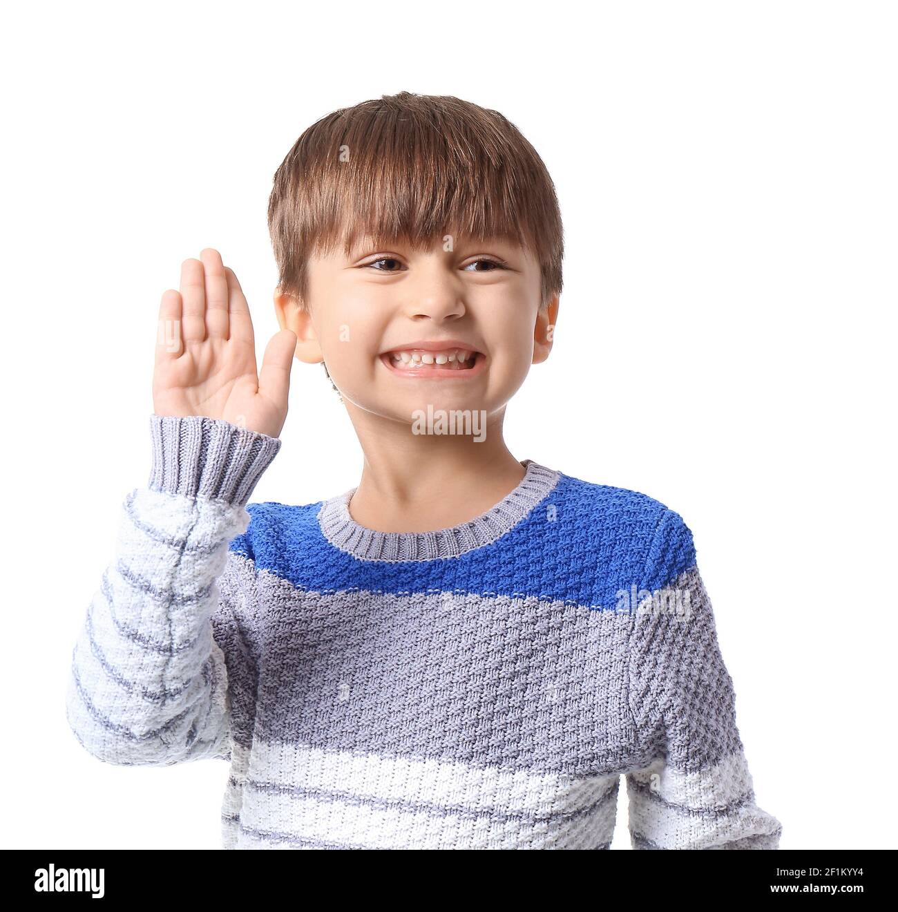 Cute little boy waving hand on white background Stock Photo - Alamy