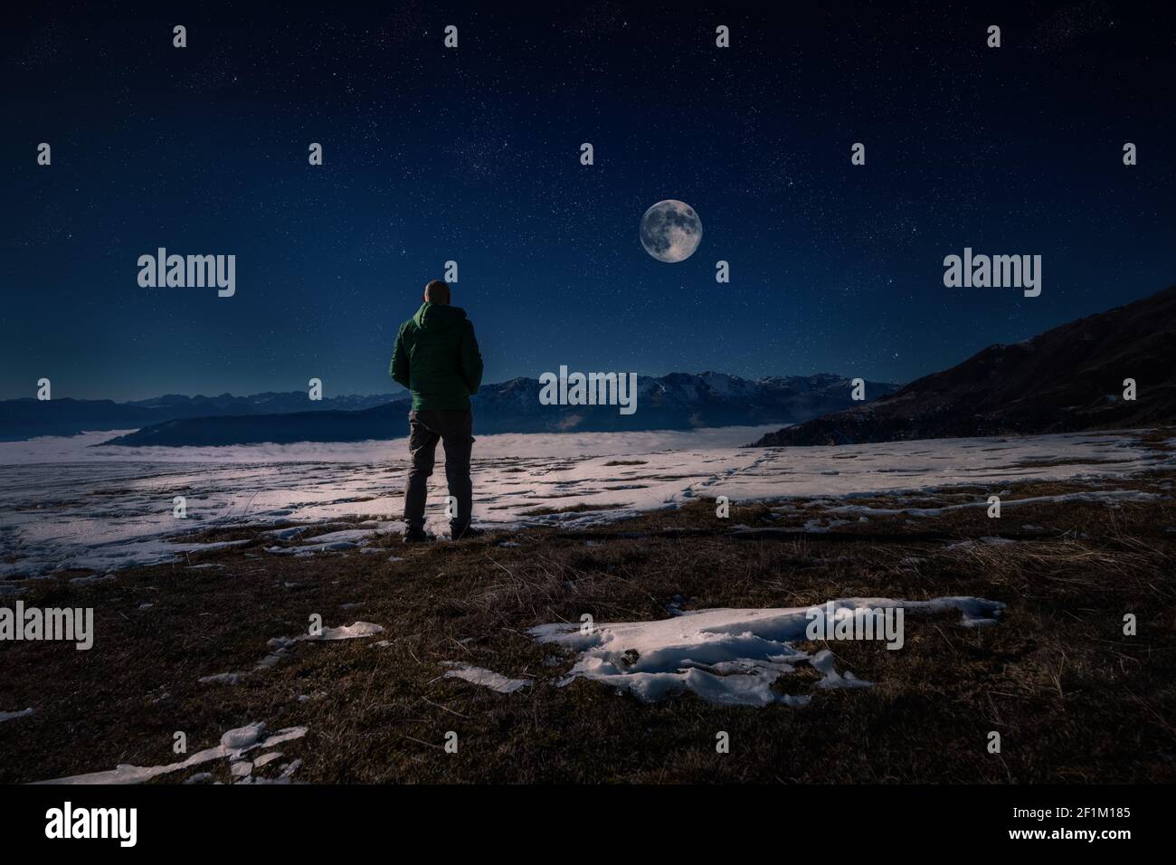 lonely man in full moon night Stock Photo - Alamy