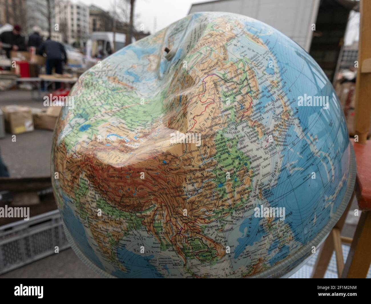 Crushed globe (planet Earth world map) with street background Stock ...