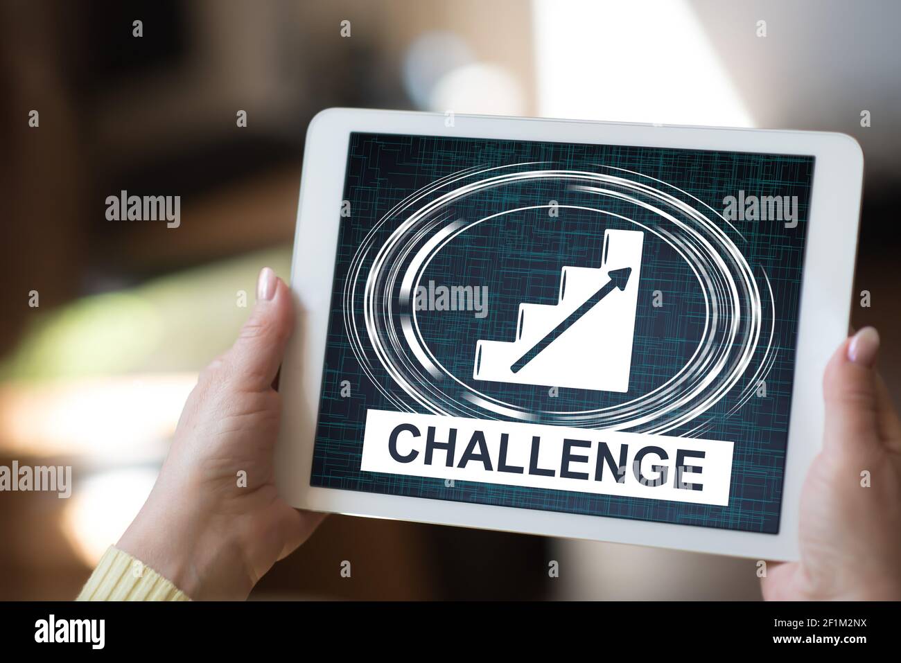 Tablet screen displaying a challenge concept Stock Photo - Alamy